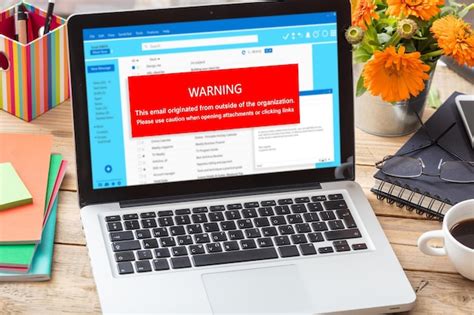 Premium Photo Email Attachment Warning Message On A Computer Laptop