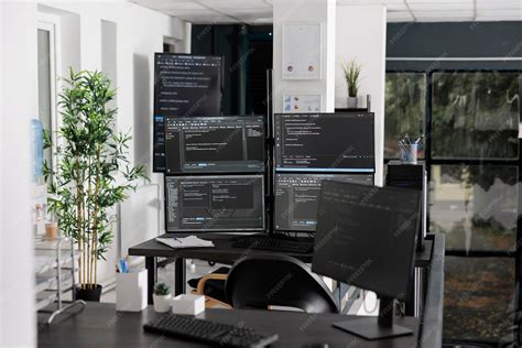 Premium Photo Computer Screens Showing Parsing Html Code In Empty It Office Security System