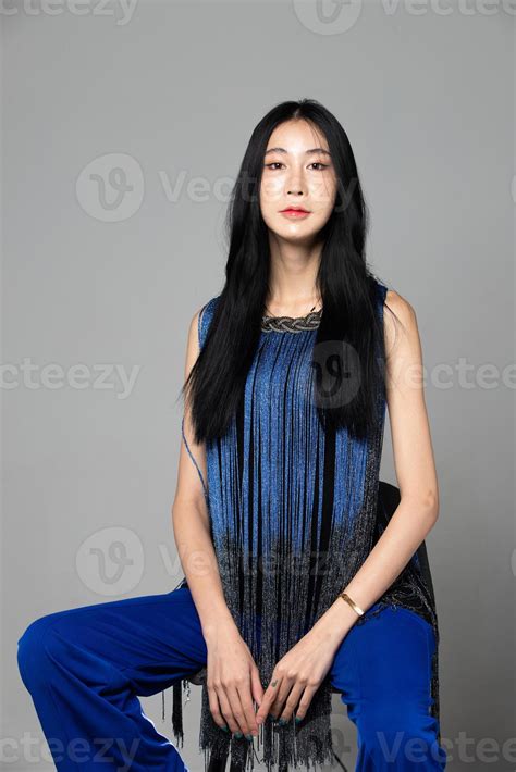 Asian Transgender Woman With Long Black Straight Hair Look At Camera