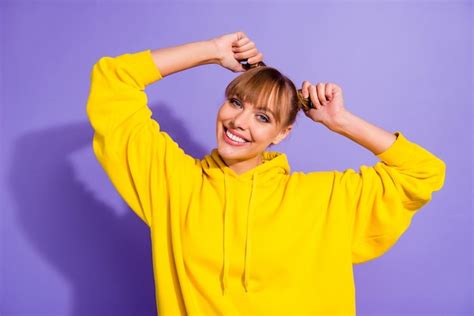 Premium Photo Stylish Girl Posing Against The Purple Wall