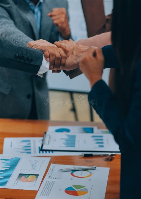 Business People Join Hand Together During Their Meeting Stock Photo