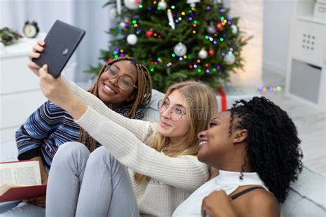 Girls Take A Selfie In Front Of A Christmas Tree Friends From Africa