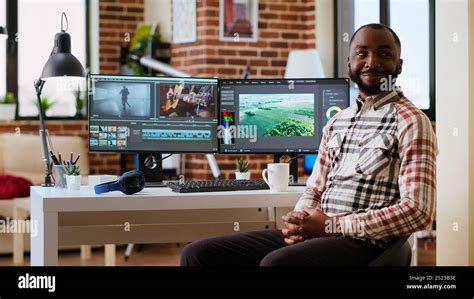 African American Male Filmmaker Works With Creative Editing Software Mixing And Color Grading