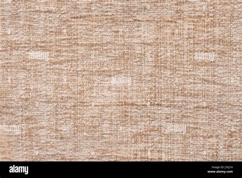 Light Brown Fluffy Background Of Soft Fleecy Cloth Texture Of Beige