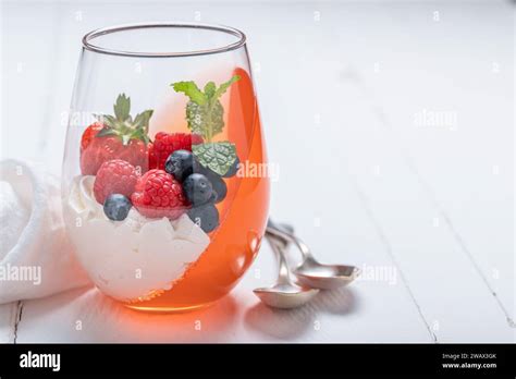 Delicious And Creamy Jelly With Whipped Cream And Berries Jelly With