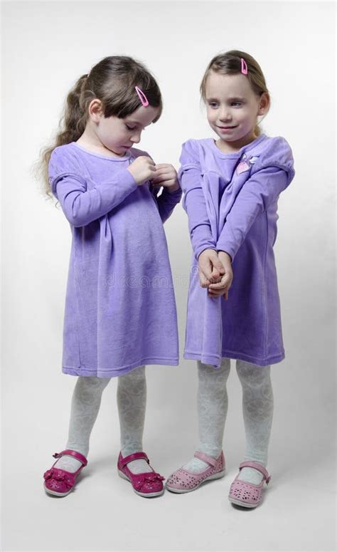 Two Sisters Twins Stock Image Image Of Hair Trick Hands 50148591