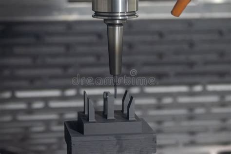 The Cnc Milling Machine Cutting The Graphite Electrode Parts With Solid Ball End Mill Stock