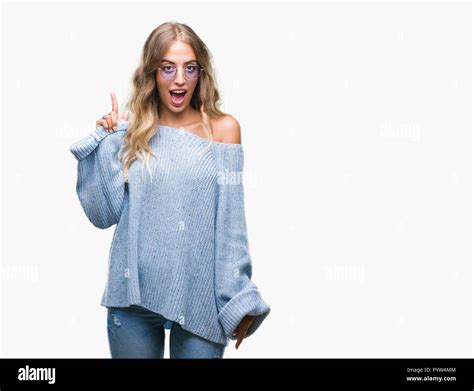 Beautiful Young Blonde Woman Wearing Sunglasses Over Isolated