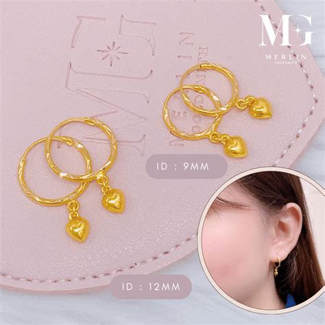 916 Gold S Cutting Hoop Earrings With Dangling Puff Heart Merlin