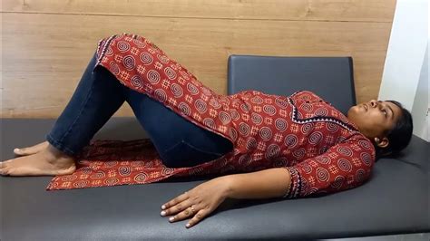 Supine Trunk Rotation exercise - YouTube