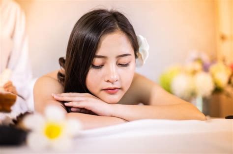 Premium Photo Woman And Masseuse At Health Spa