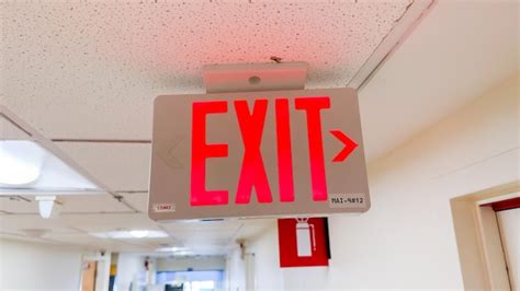 Premium Photo Exit Signs Universal Symbols Of Escape And Safety