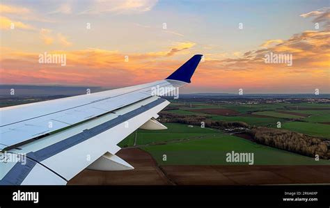 Wing Of An Aircraft With Flaps Extended And Performing The Approach Of