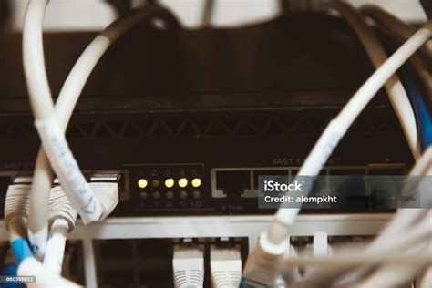 Network Switch And Utp Ethernet Cables Closeup In Server Room Stock