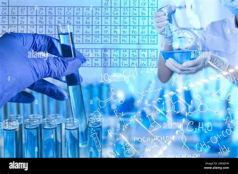 Scientists Working With Samples Periodic Table Of Elements And