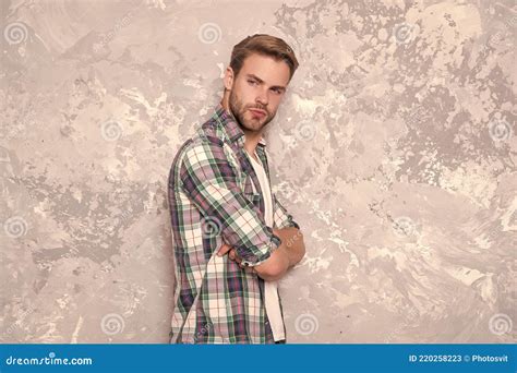 Handsome Unshaven Man Touching His Beard And Moustache Unshaven Man