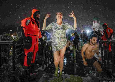 Orthodox Epiphany Devotees Brave Icy Waters In Religious Tradition