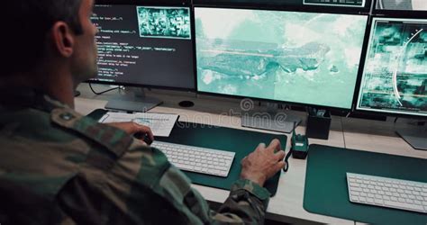 Man Soldier And Typing With Computer Screen In Control Room Military Battle And Monitoring War