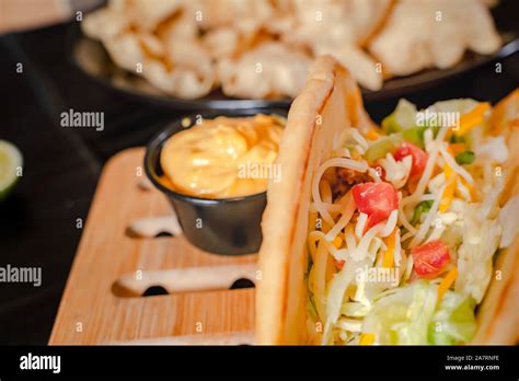 Homemade Baja Fish Tacos With Mango Salsa And Chips Mixed Mexican Food Guacamole Nachos
