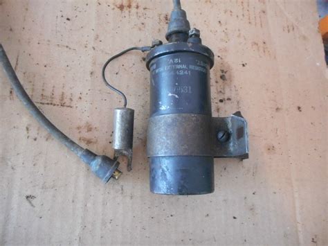 Sold Oem Ignition Coil With Bracket And Capacitor For E Bodies