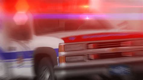 Woman Hospitalized After Being Pinned Under Car