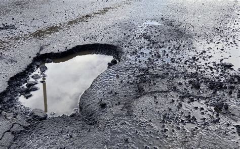 As Height Of Pothole Season Nears Drivers Dodge Craters While City Struggles To Patch Them