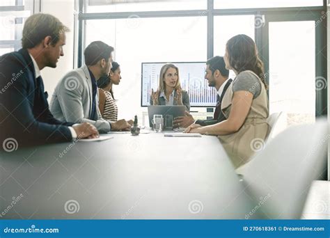 Presenting Ideas To The Team Corporate Businesspeople Meeting In The Boardroom Stock Image