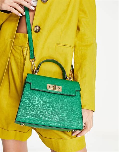 Asos Design Lock Detail Bag With Top Handle And Detachable Crossbody