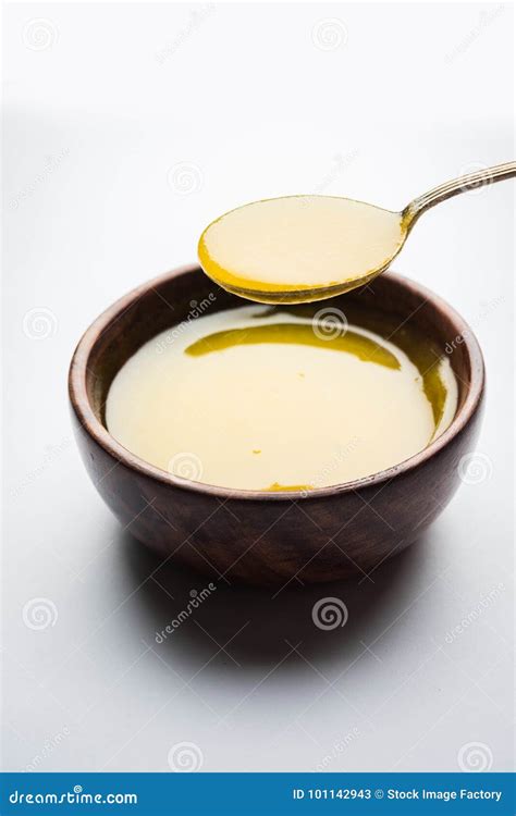 Indian Or Desi Ghee Or Pure Ghee Served In A Wooden Bowl Stock Image