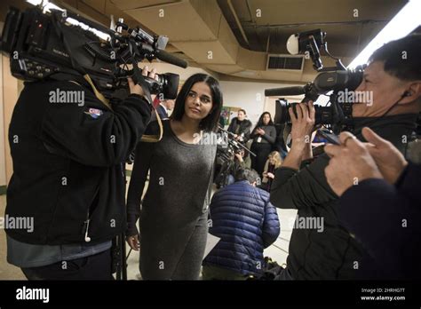Saudi Woman Rahaf Mohammed Makes Her Way Through A Crowd Of Media After