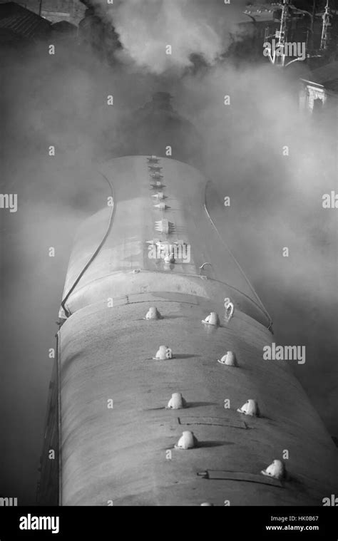 Victorian Era Steam Train Engine With Full Steam In Black And White