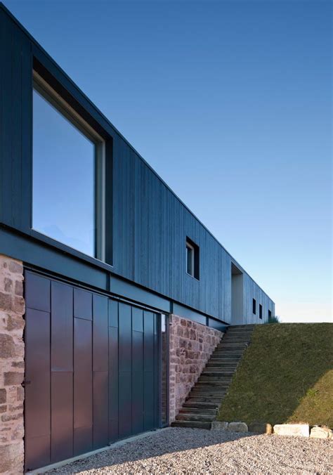 Tap Architects Builds Black House Atop Old Granite Mill In Scotland