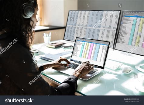Data Analyst African Woman Using Spreadsheet Stock Photo Edit Now
