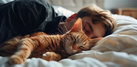 Man And Cat Sleeping In Bed Together Premium Ai Generated Image