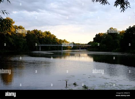 Panoramic View Of Old Blue Bridge Across Still Waters Of River Stock