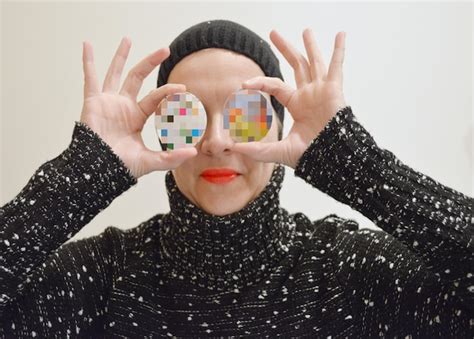 Premium Photo Close Up Of Woman In Costume Covering Eyes With Multi