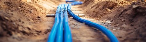 Rola studni kablowych w infrastrukturze światłowodowej jak studnie