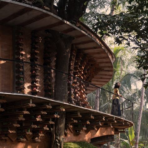 Chuzhi House By Wallmakers Resembles Snake Curling Up Under A Rock