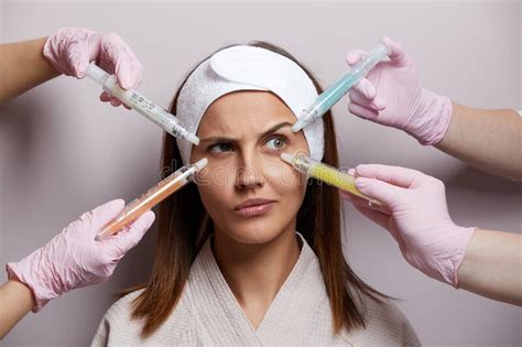 Conceptual Beauty And Cosmetology Image Of The Hands Of Several