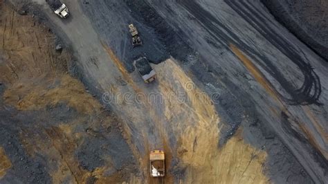 A Stunning Aerial View Depicting Heavy Machinery Engaged In Large Scale