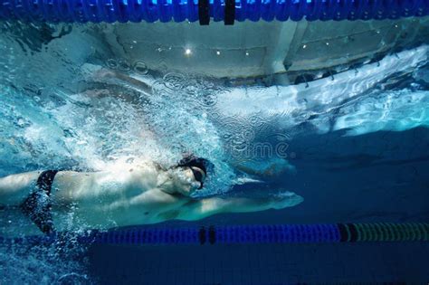 Underwater Training And Person In Pool Swimming And Cardio For