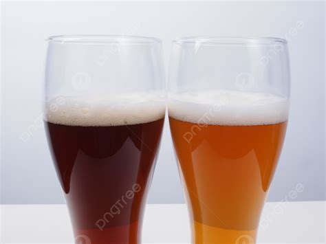 Two Glasses Of German Beer Dunkel Weizen Pint Alcohol Photo Background