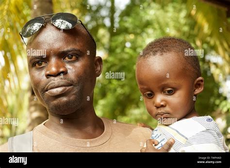 Grandma With Granddaughter In Front Of Her House Hut In Kenya Stock