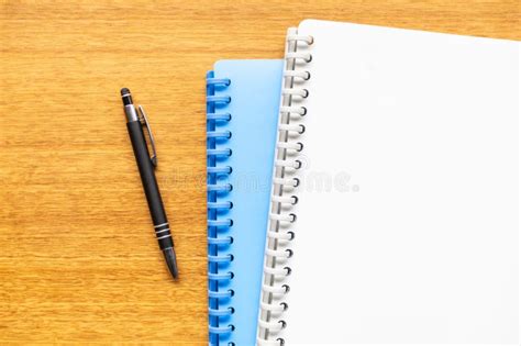 Two Closed Notebooks And Pen On Wooden Table Stock Image Image Of Green Table 308245813