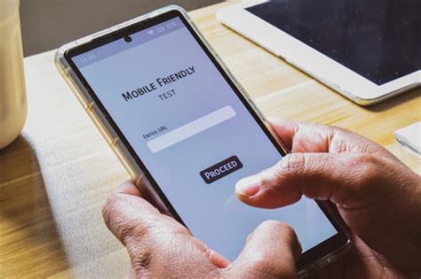 Person Testing Mobile Friendliness Tool To Analyse The Look And