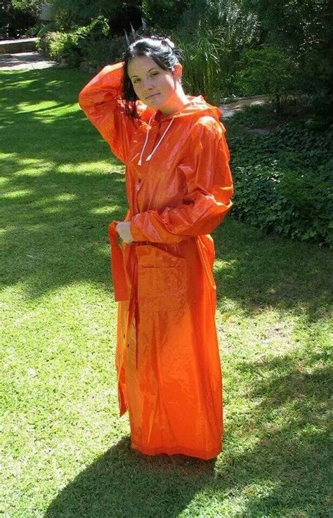 Adele Wearing A Long Orange Pvc Mackintosh Red Raincoat Vinyl Raincoat