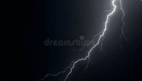 Stunning Night Sky Capture Of A Dramatic Lightning Bolt Striking Across The Dark Clouds Stock
