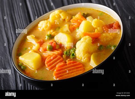 Vegetarian Curry From Vegetables With Coconut Milk Close Up In A Bowl