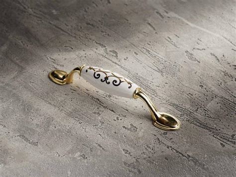 Ручка меблева кераміка золото — ціна 35 грн у каталозі Меблева фурнітура Купити товари для дому