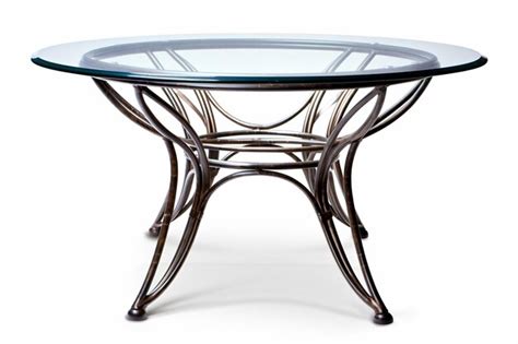 Premium Photo A Glass Table With A Metal Base And A Glass Top